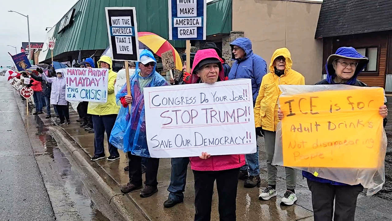 Demonstrators Protest Trump's Agenda at Brainerd May Day Rally
